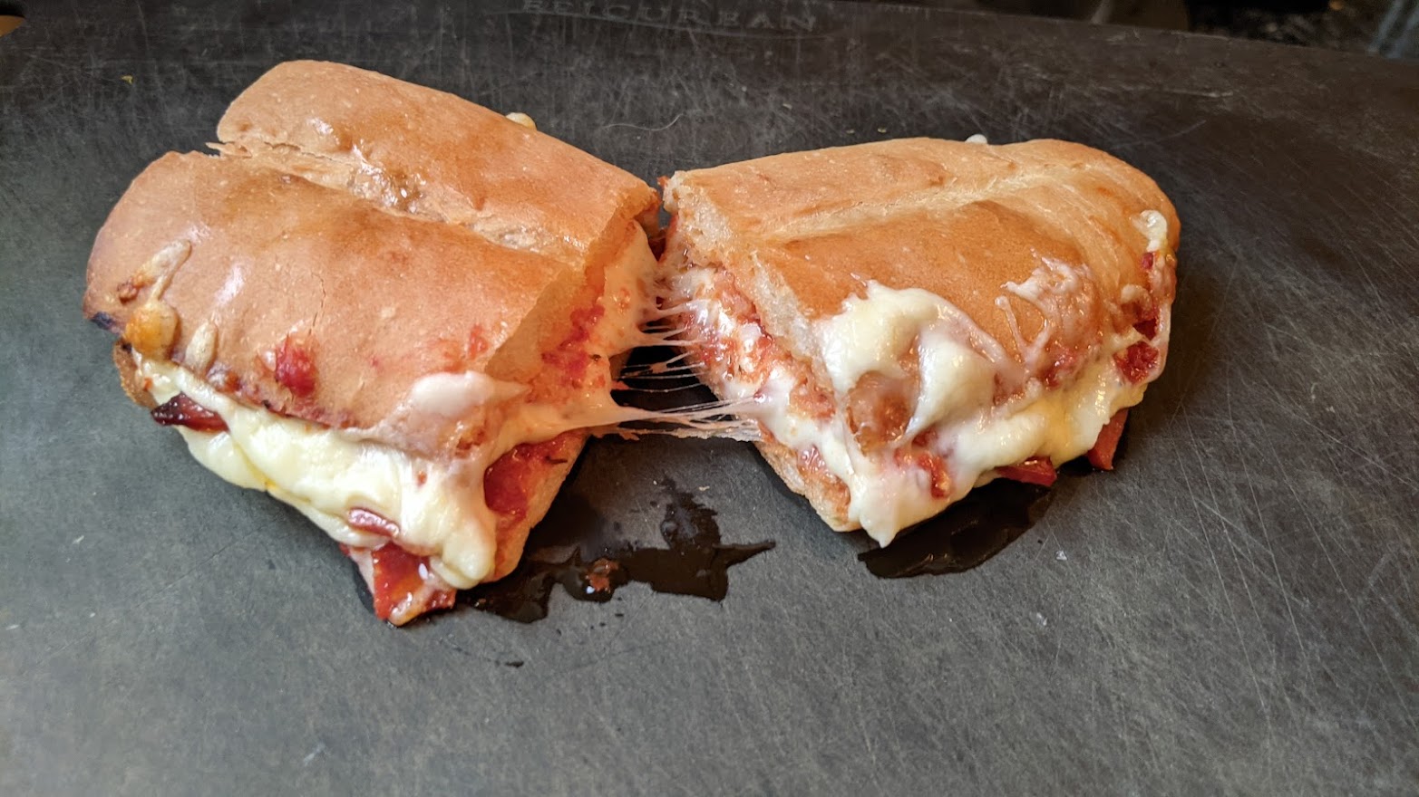 Open-faced pizza sandwich – Bounded by Buns
